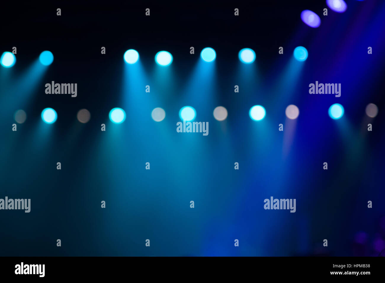 Stage lights on concert. Lighting equipment with multi-colored beams ...