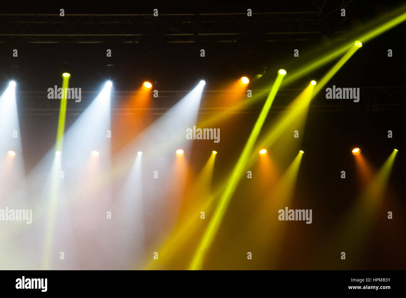 Stage lights on concert. Lighting equipment with multicolored beams ...