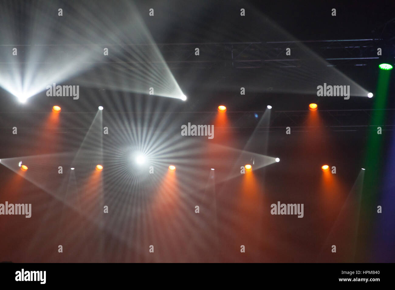 Stage lights on concert. Lighting equipment with multicolored beams ...