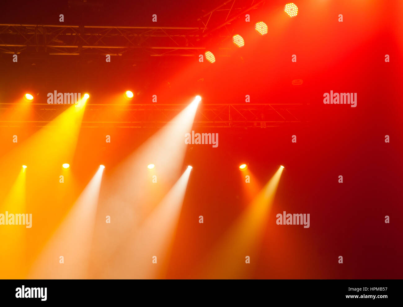 Stage lights on concert. Lighting equipment with multicolored beams ...