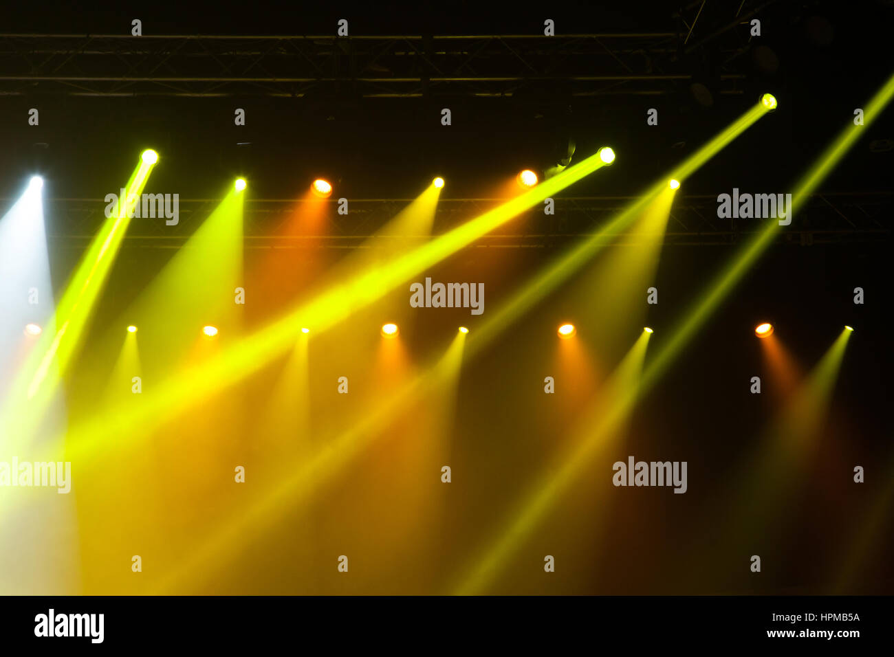 Stage lights on concert. Lighting equipment with multicolored beams ...