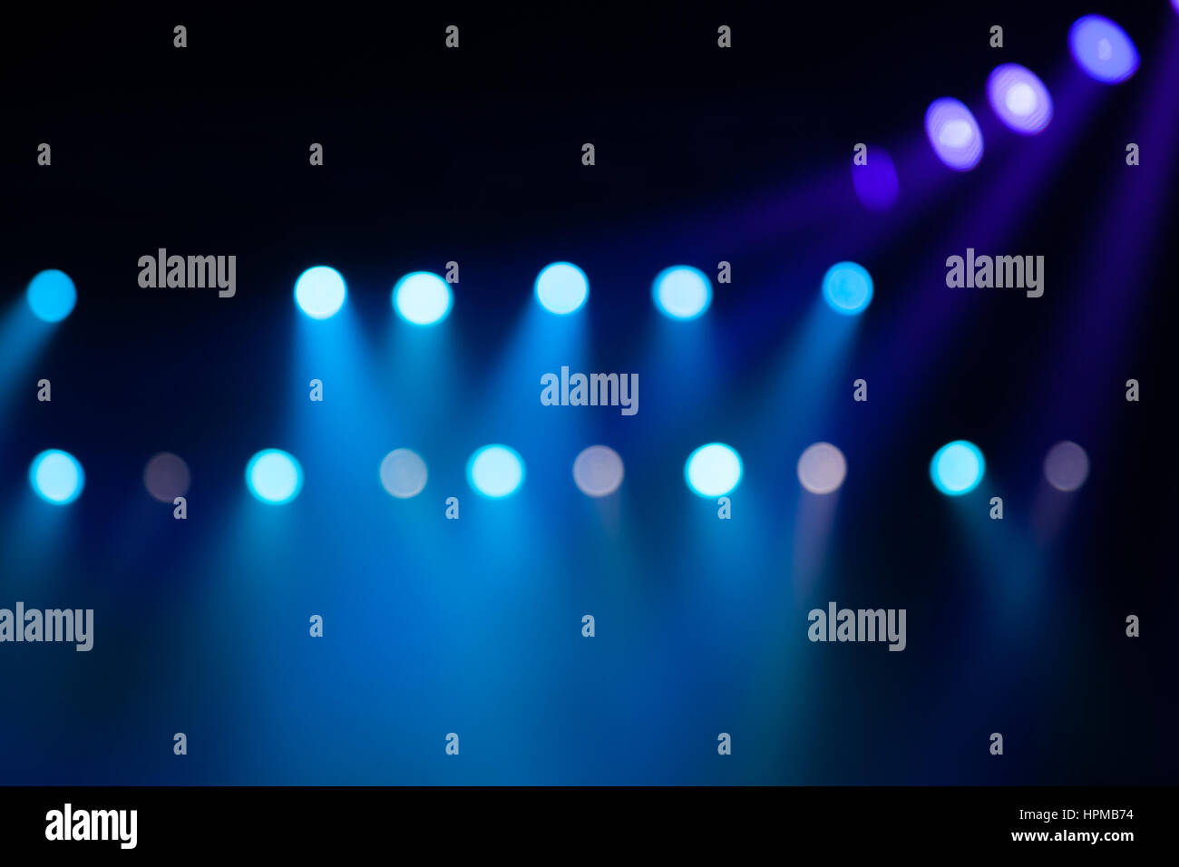 Stage lights on concert. Lighting equipment with multicolored beams ...