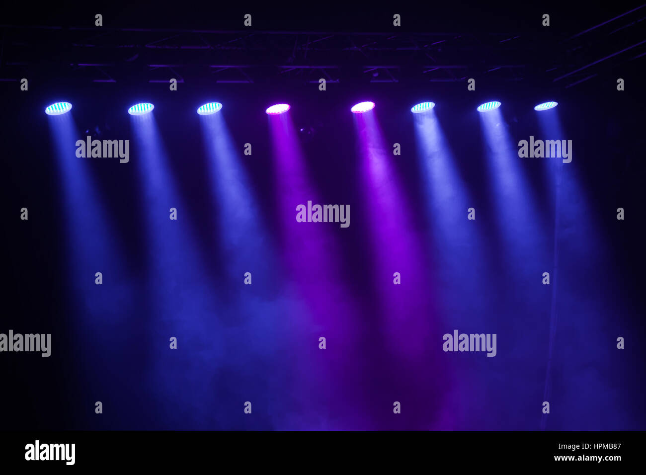 Stage lights on concert. Lighting equipment with multicolored beams ...