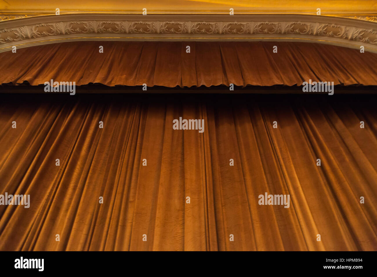 Lowered the curtain in the theater Stock Photo - Alamy