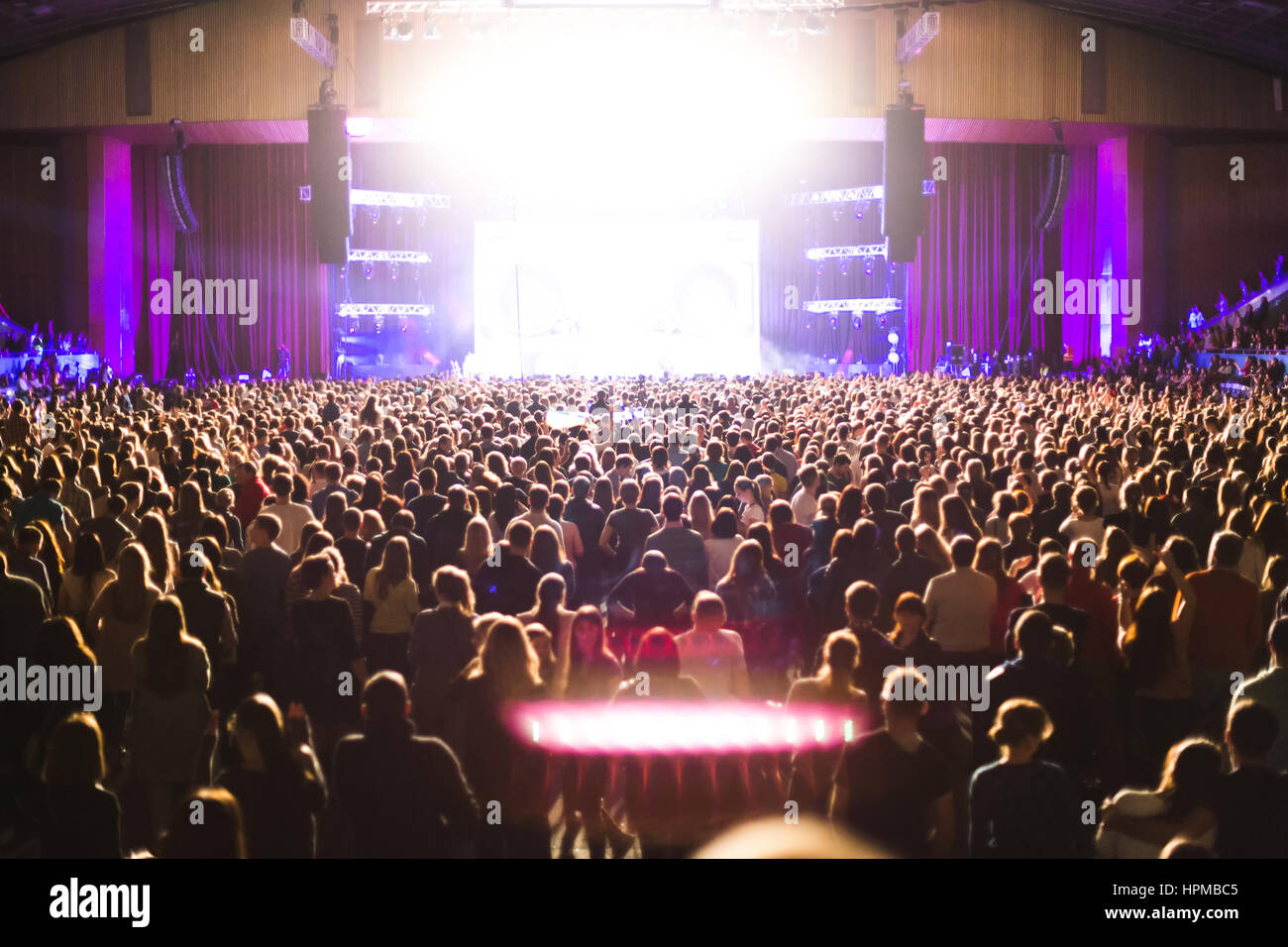 Large concert hall filled with spectators before the stage Stock Photo ...