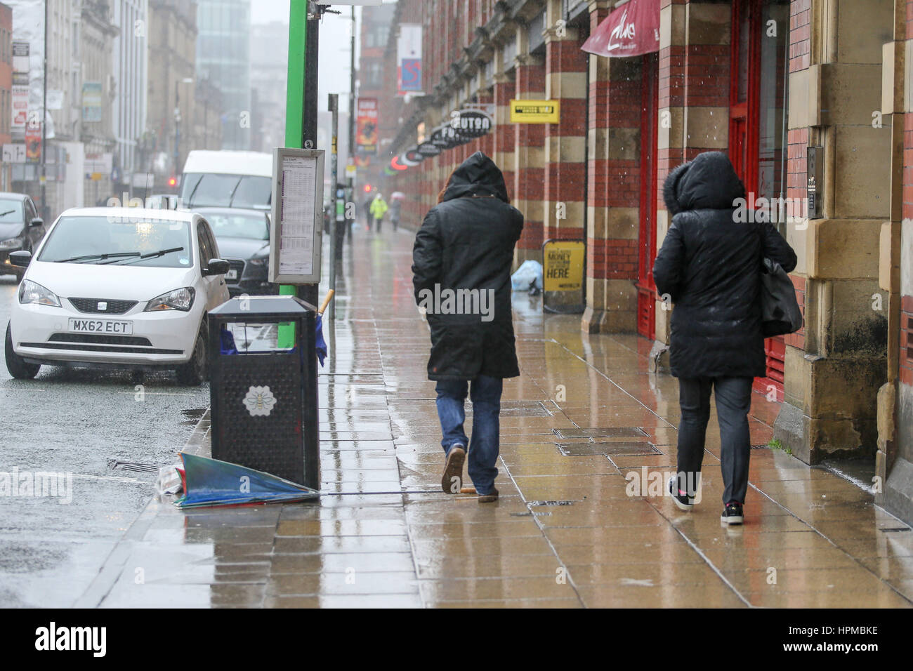 Storm Doris hits commuters in Manchester with heavy rain and wind Stock ...