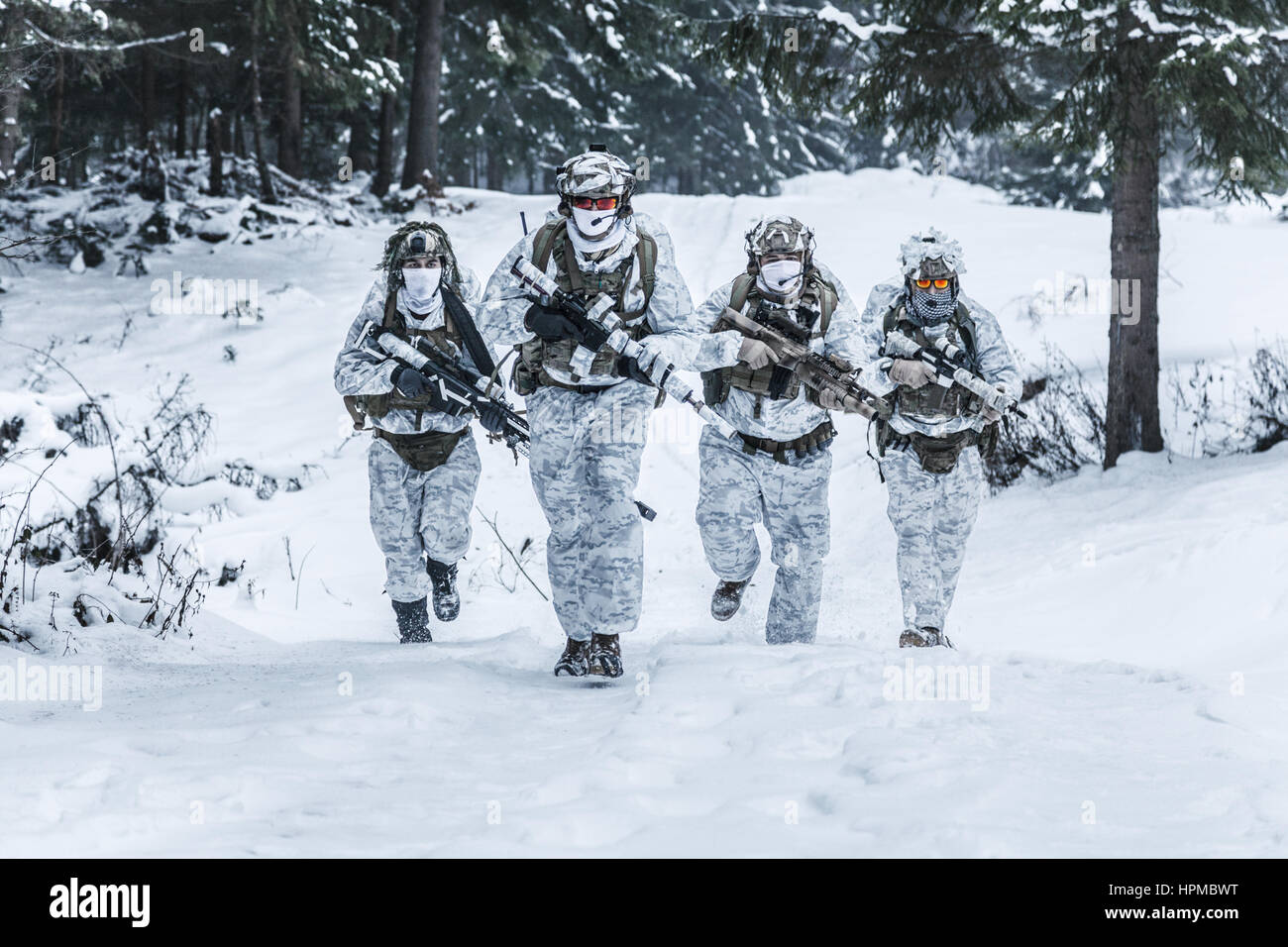 Squad of soldiers in winter forest Stock Photo - Alamy