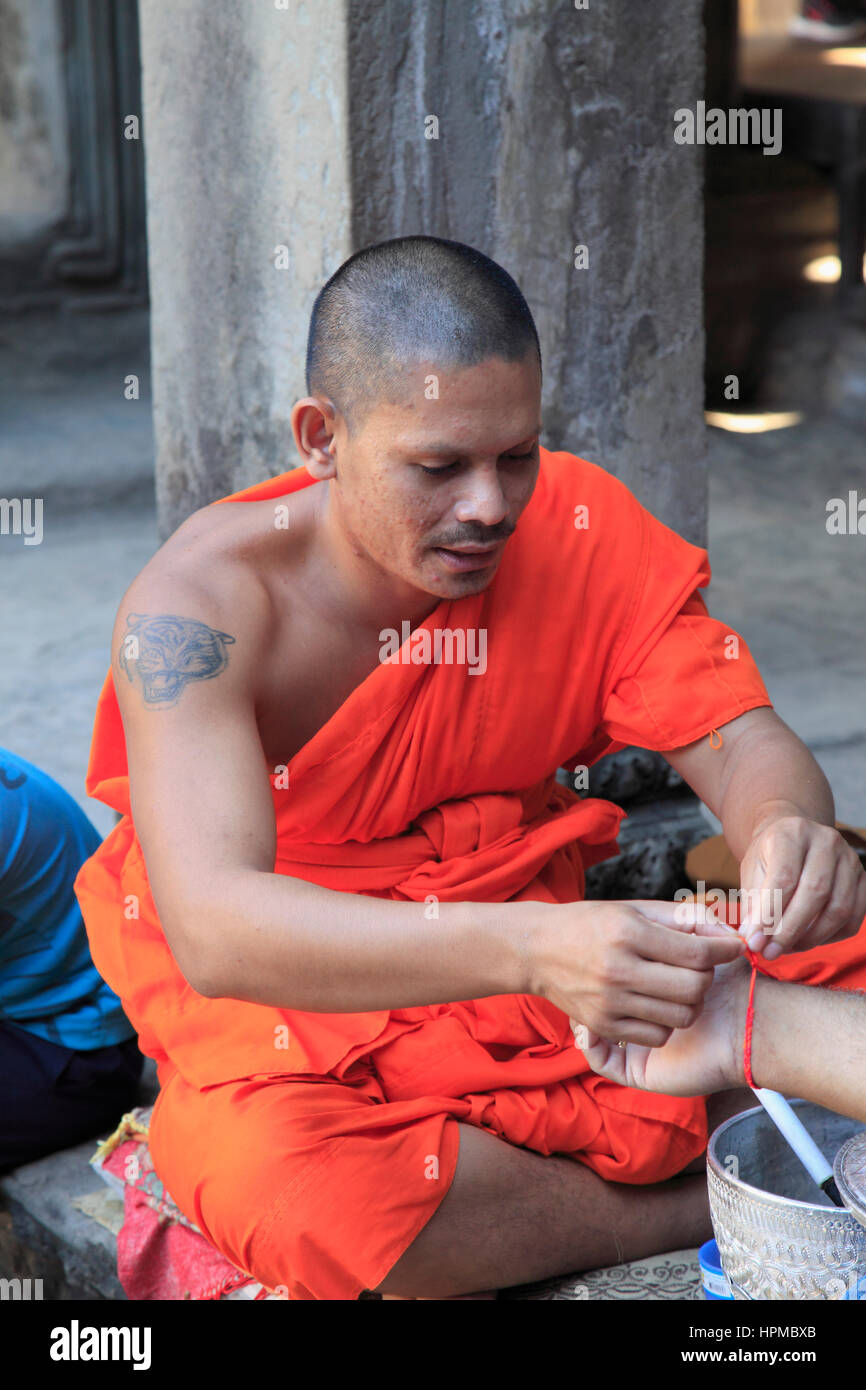 Cambodia, Angkor, Angkor Wat, buddhist monk, giving blessings Stock ...