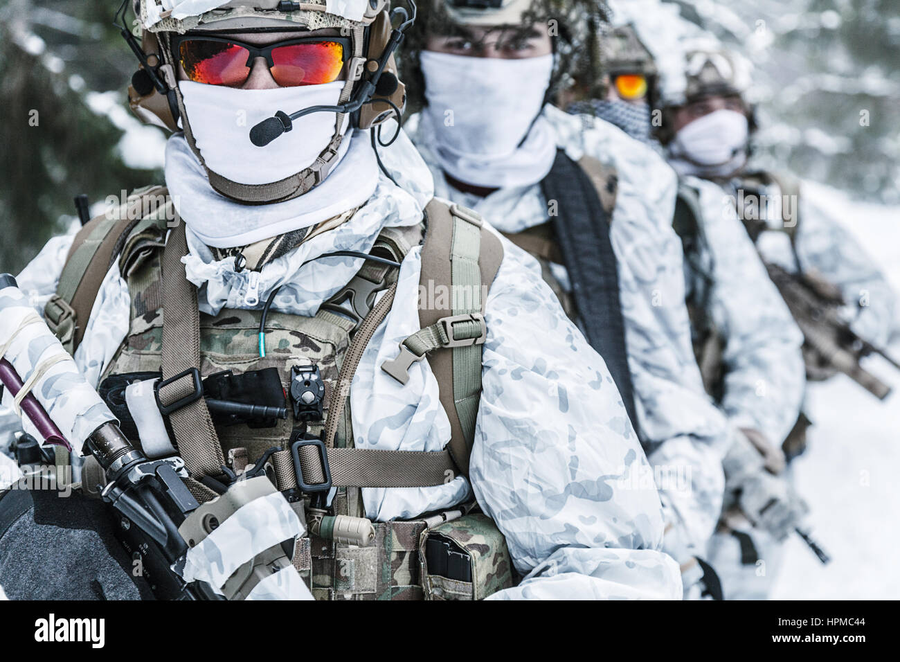 Squad of soldiers in winter forest Stock Photo - Alamy
