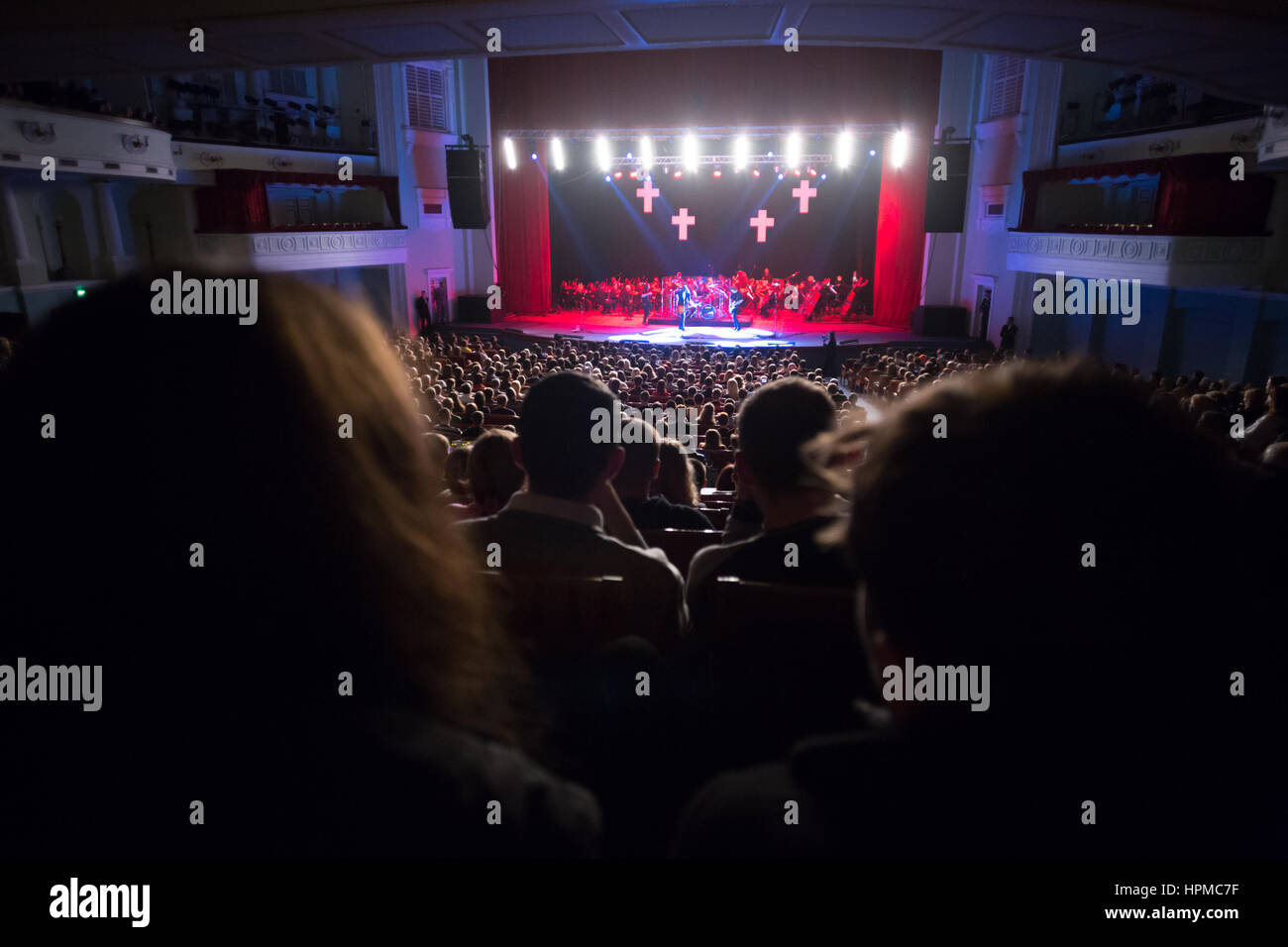 The audience watching the concert on stage Stock Photo - Alamy