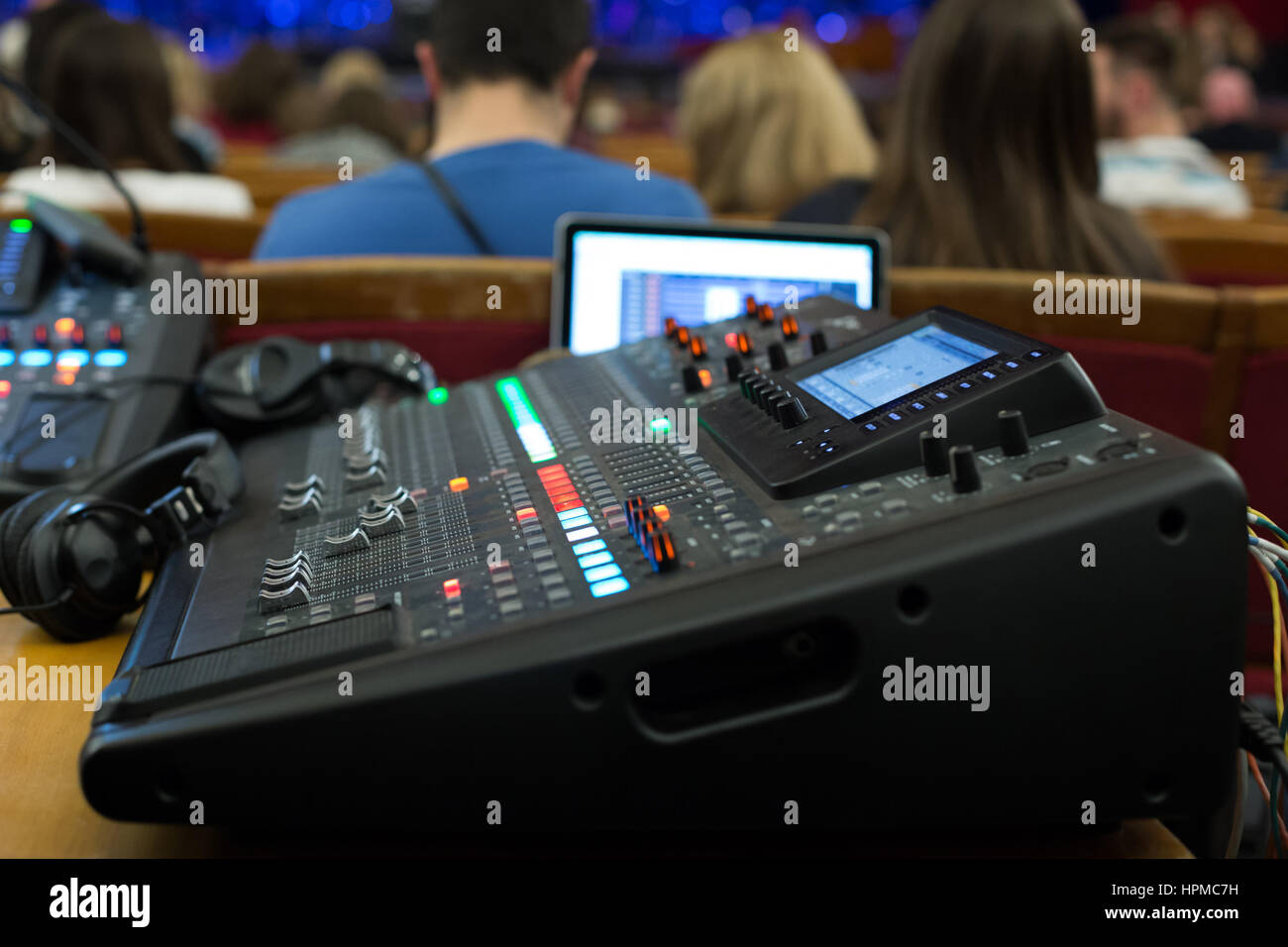 Work place sound engineer's in concert hall. Mixing console Stock Photo ...
