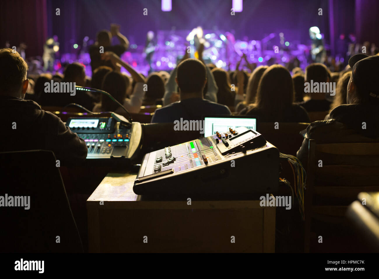 Soundman working on mixing console hi-res stock photography and images ...