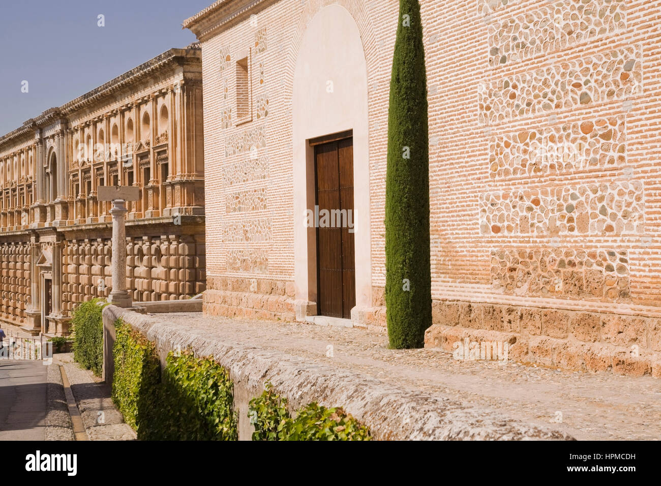 Stone and brick buildings at Alhambra palace grounds, Granada, Spain ...