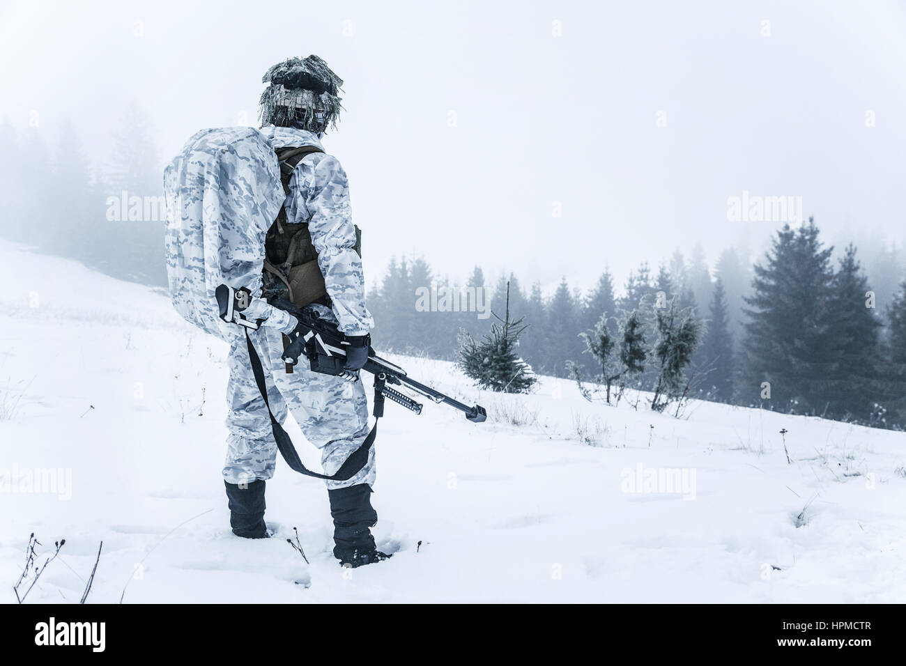 Action in cold conditions sniper with weapons Stock Photo - Alamy
