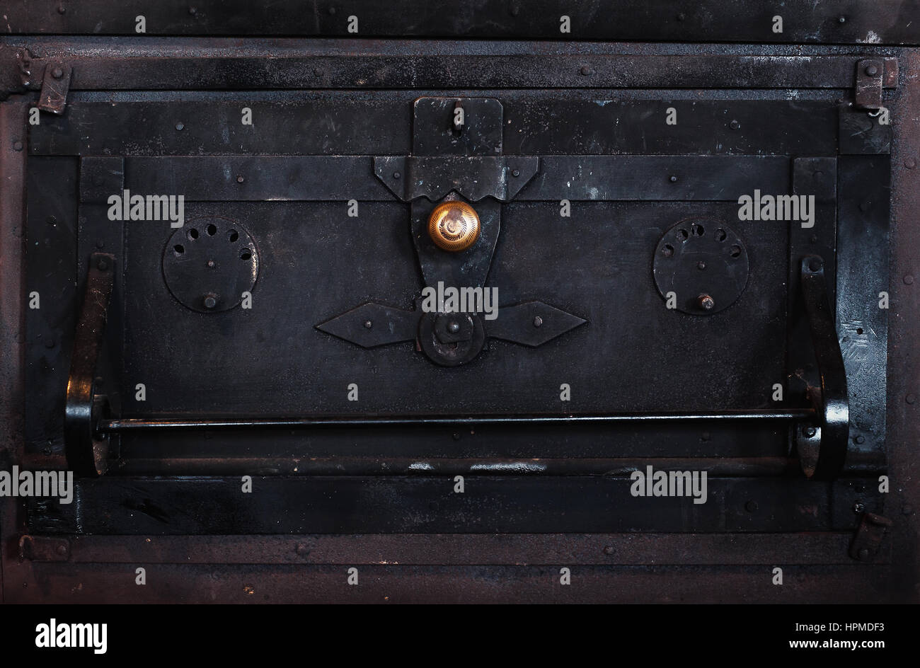 Closeup view of an old metal oven Stock Photo - Alamy