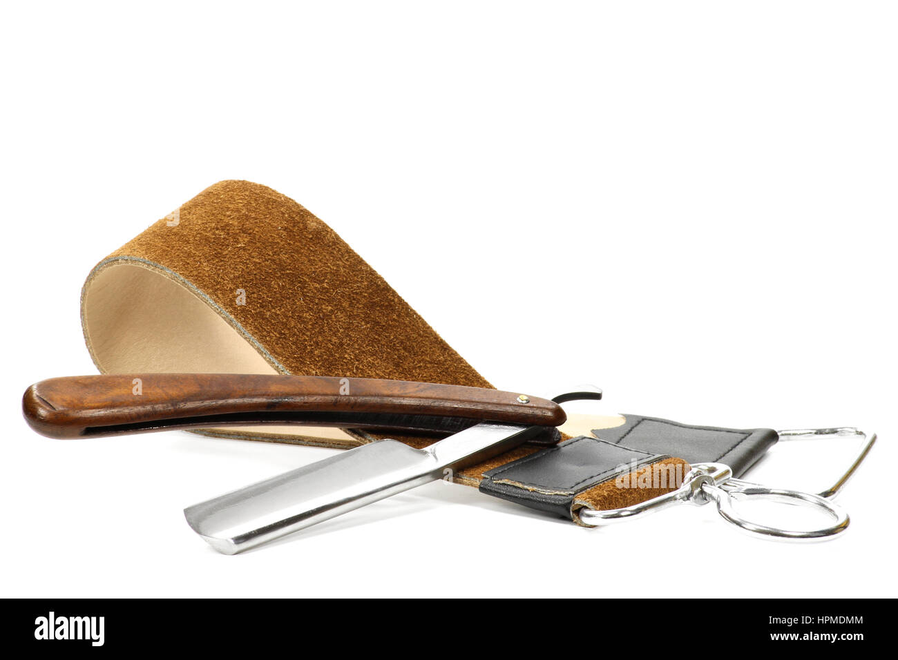 straight razor with leather strop isolated on white background Stock ...