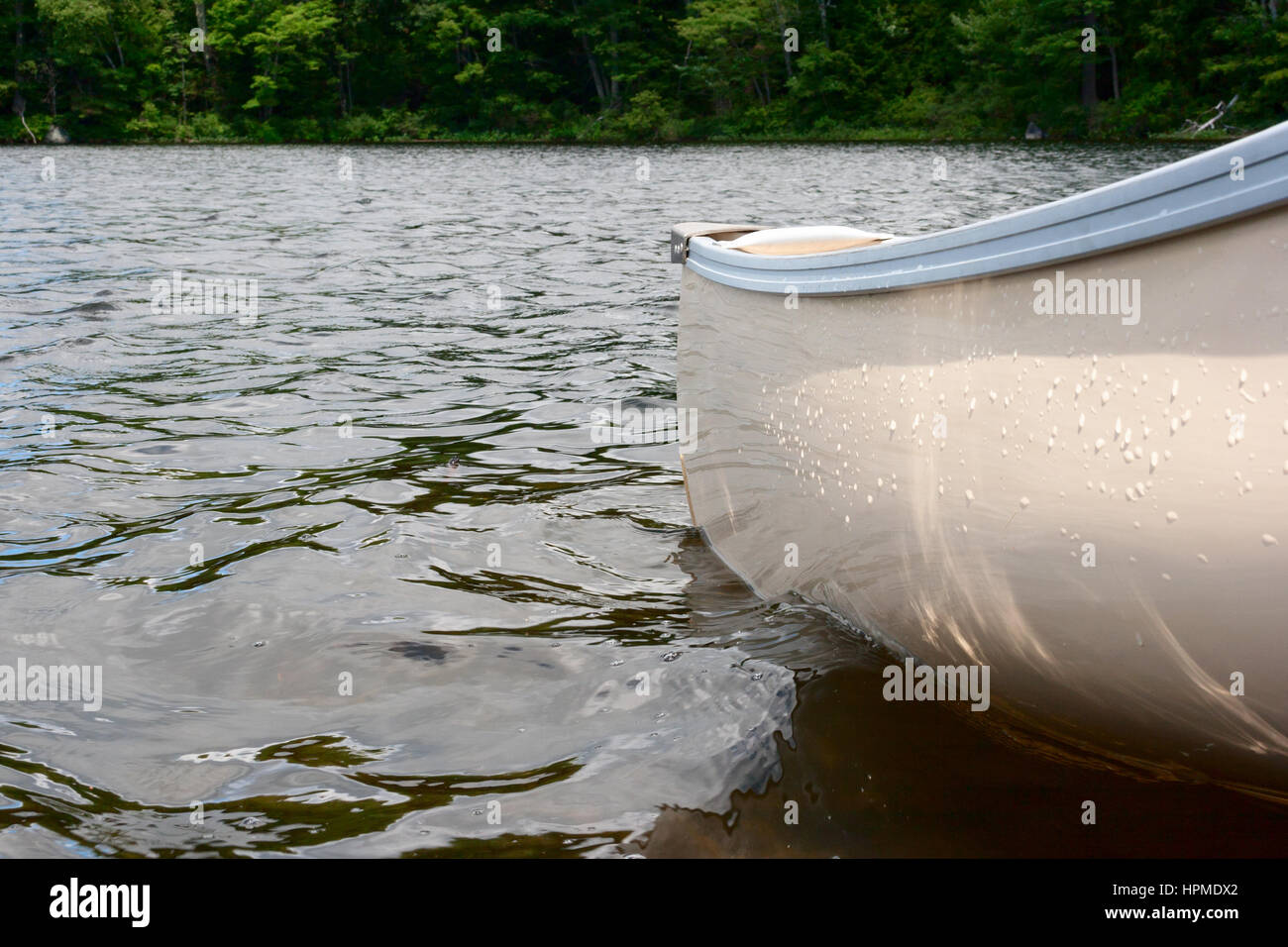 Front of canoe on the lake Stock Photo - Alamy