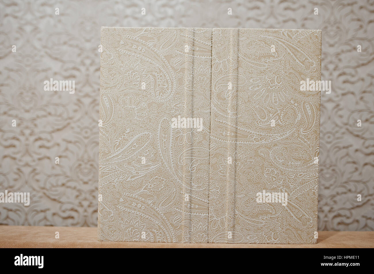 Elegant wedding album and photo book from beige material Stock Photo ...