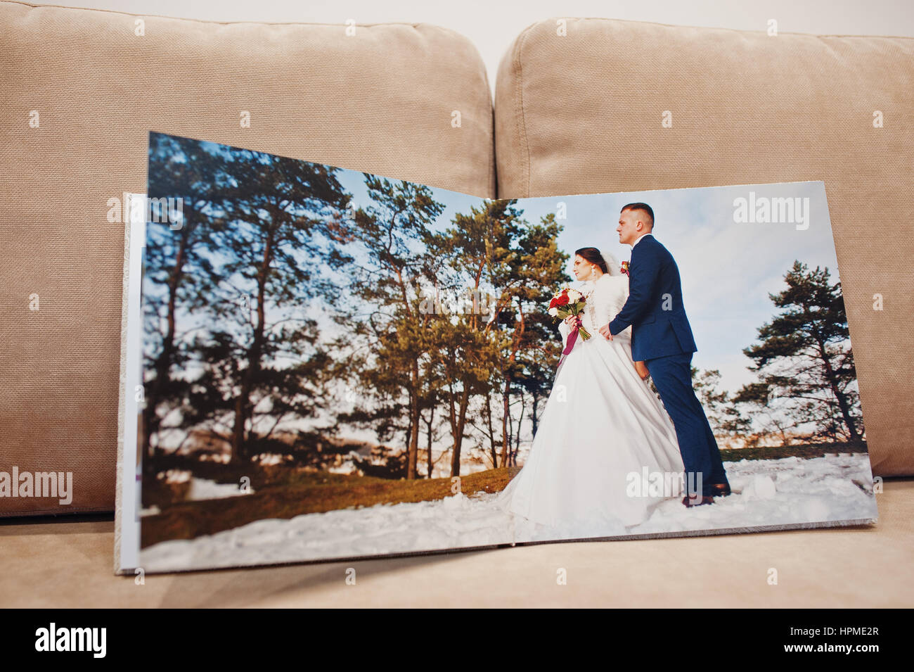 Pages of elegant wedding album and photo book Stock Photo - Alamy