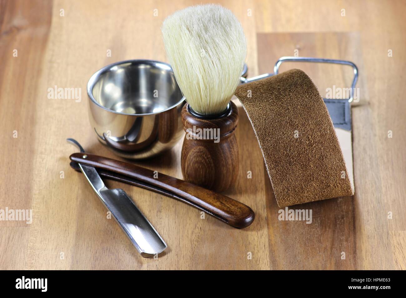 straight razor with accessories on wooden background Stock Photo - Alamy