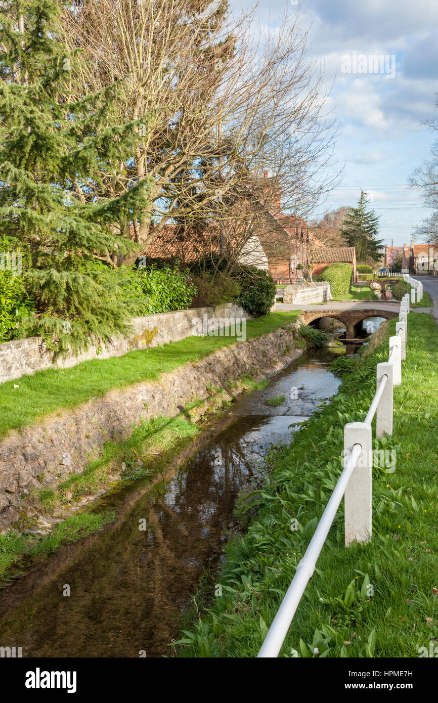 Stream running alongside houses and through the Nottinghamshire village ...