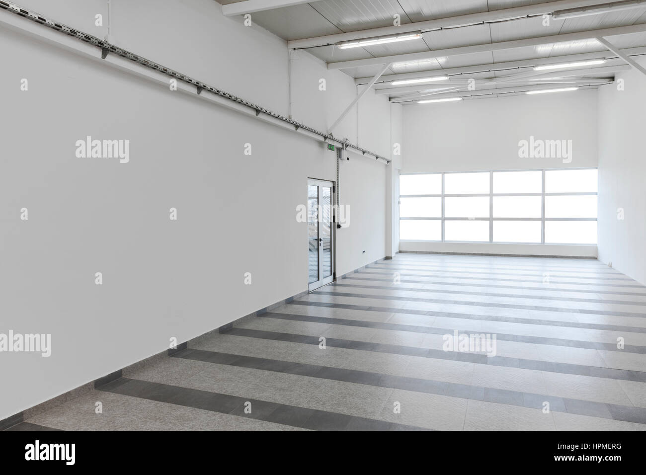 empty storage place, industrial background Stock Photo - Alamy