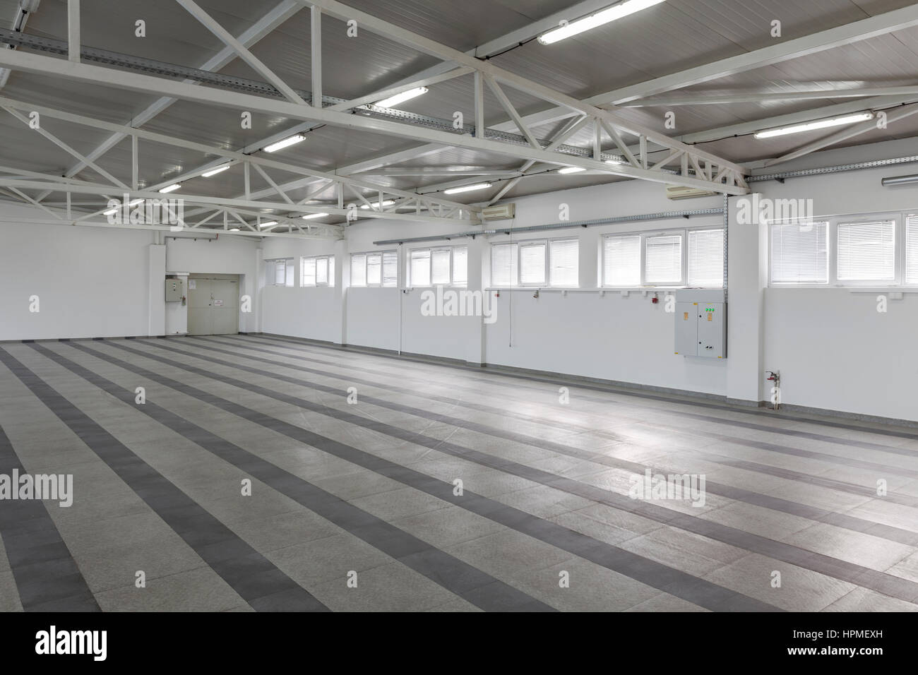 empty storage place, industrial background Stock Photo - Alamy