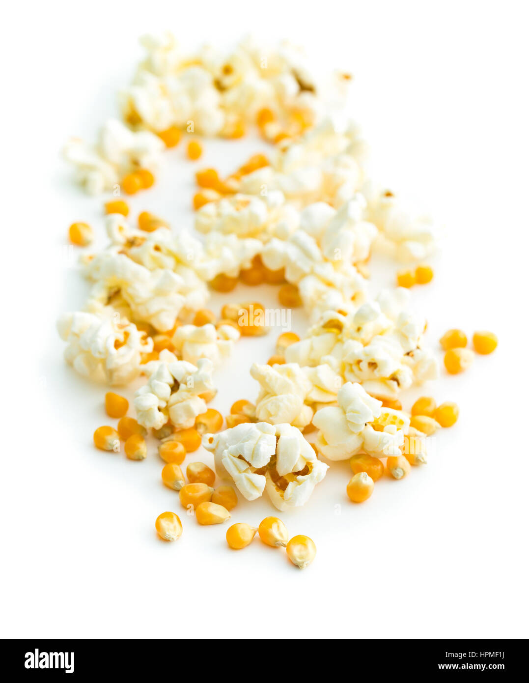 Popcorn and corn seeds isolated on white background Stock Photo - Alamy