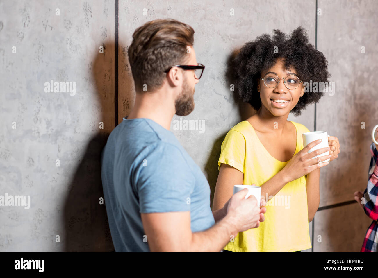 Coworkers having a coffee break Stock Photo - Alamy