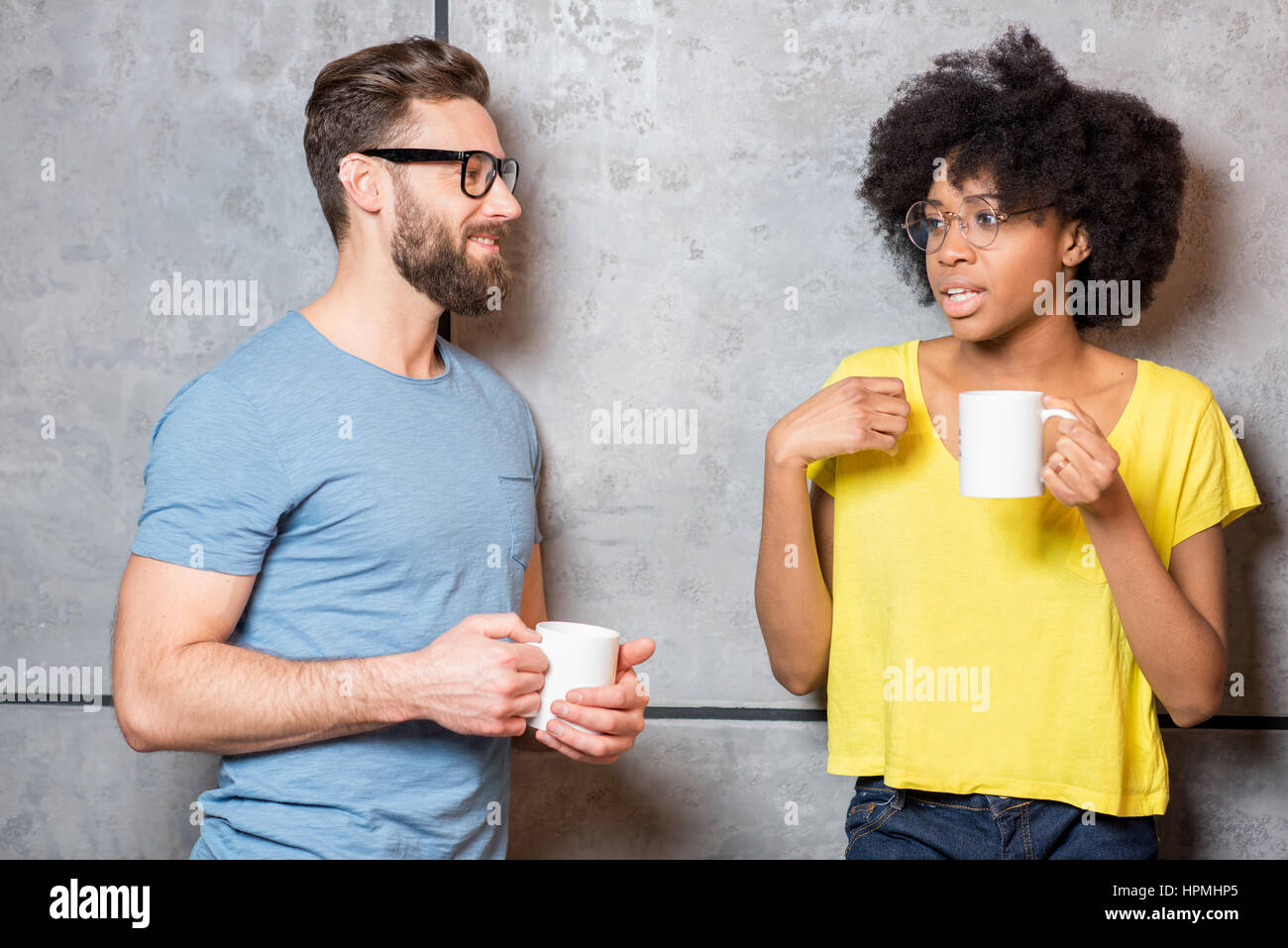 Coworkers having a coffee break Stock Photo - Alamy