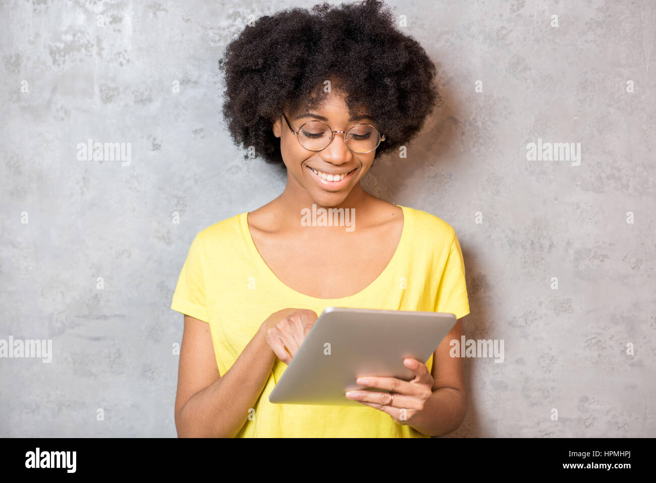 Portrait of african woman with tablet Stock Photo - Alamy