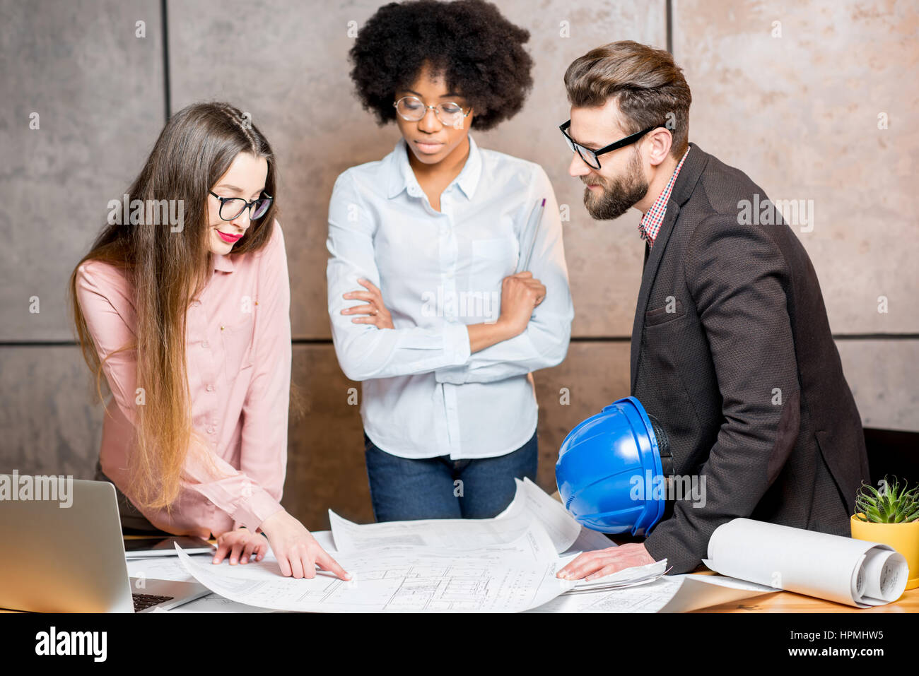 Architects working at the office Stock Photo - Alamy