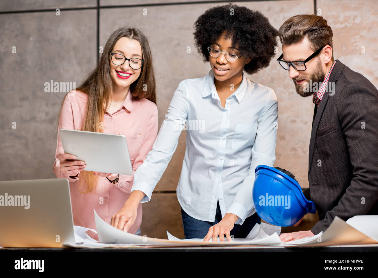 Young architects interior designers work hi-res stock photography and ...