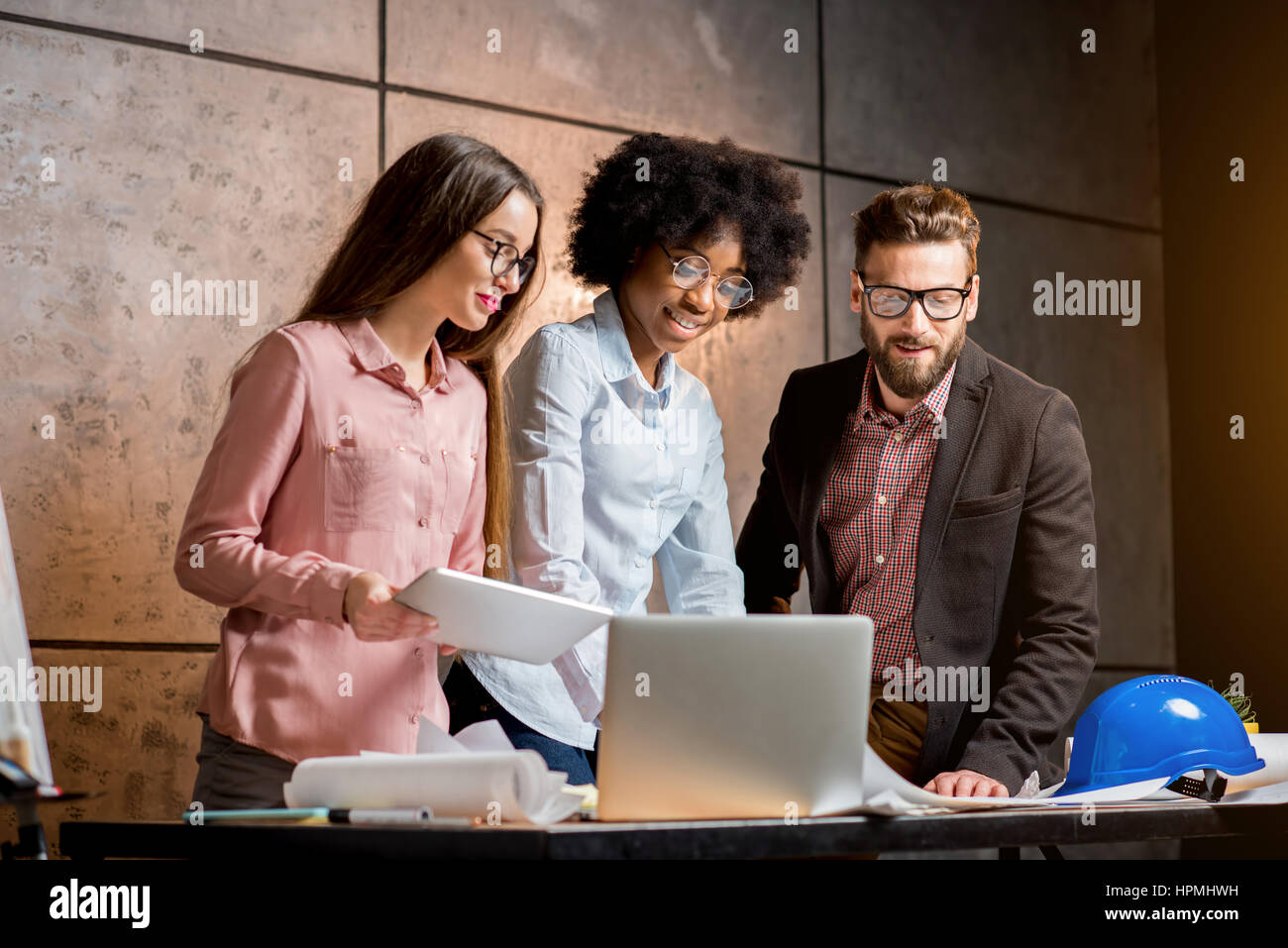 Young architects interior designers work hi-res stock photography and ...