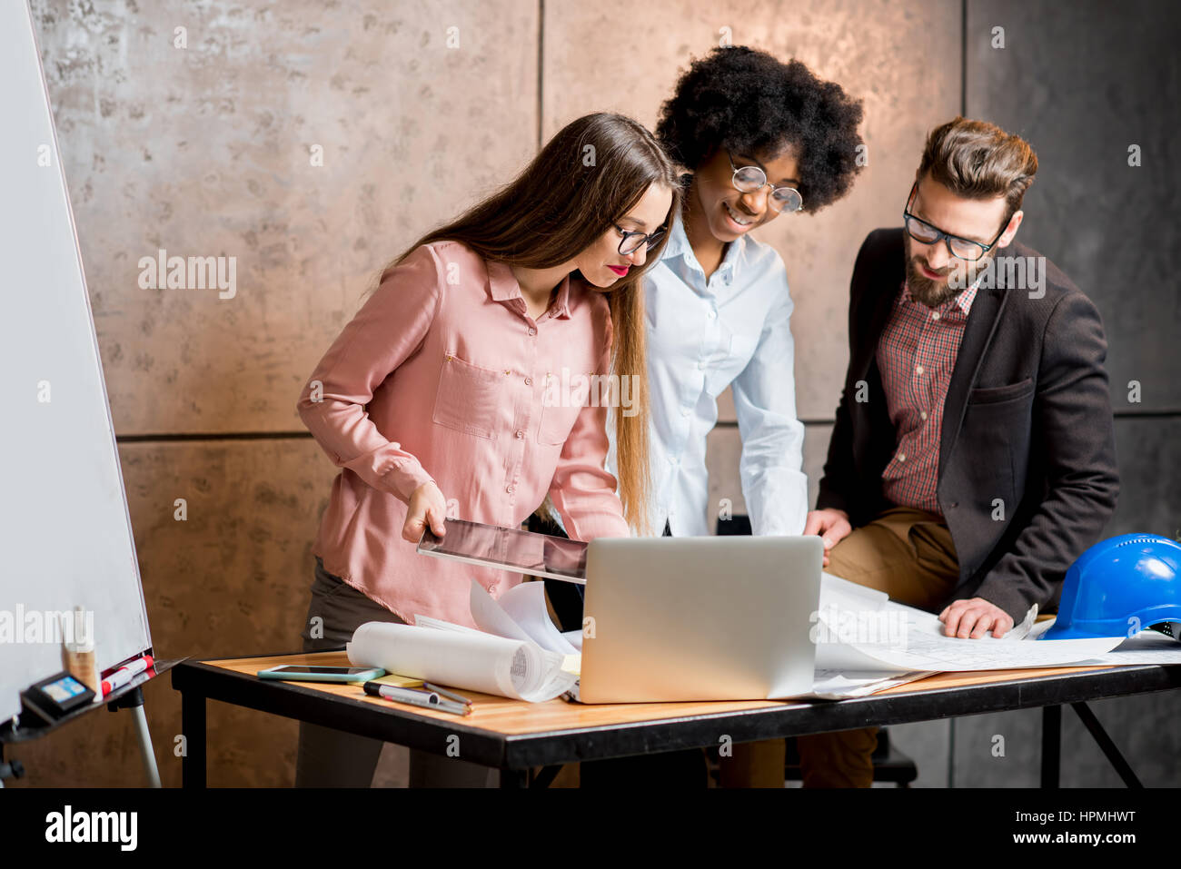 Architects working at the office Stock Photo - Alamy