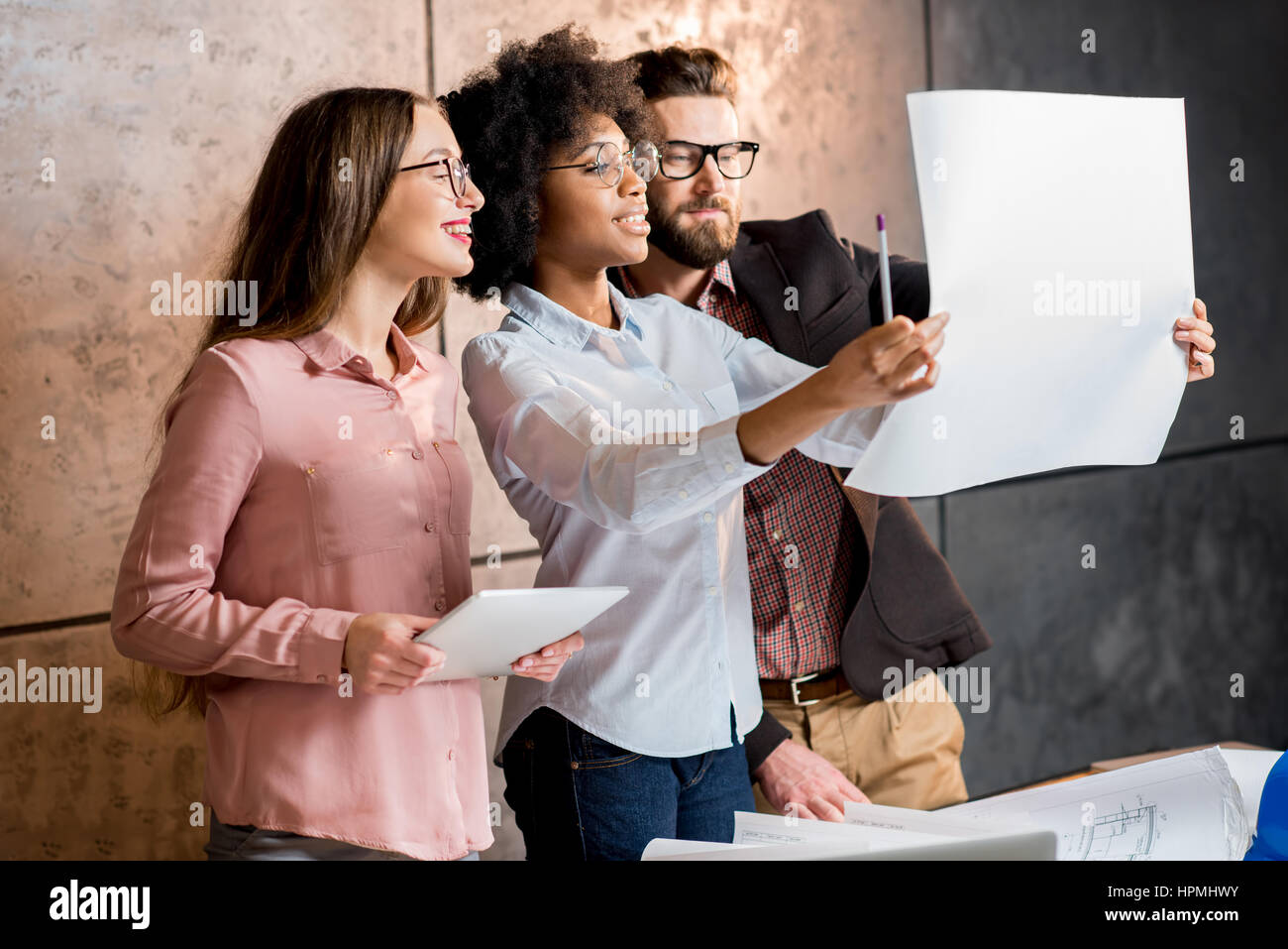 Architects working at the office Stock Photo - Alamy