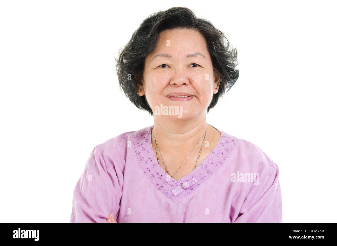Portrait of 60s Asian senior adult woman smiling, isolated on white ...