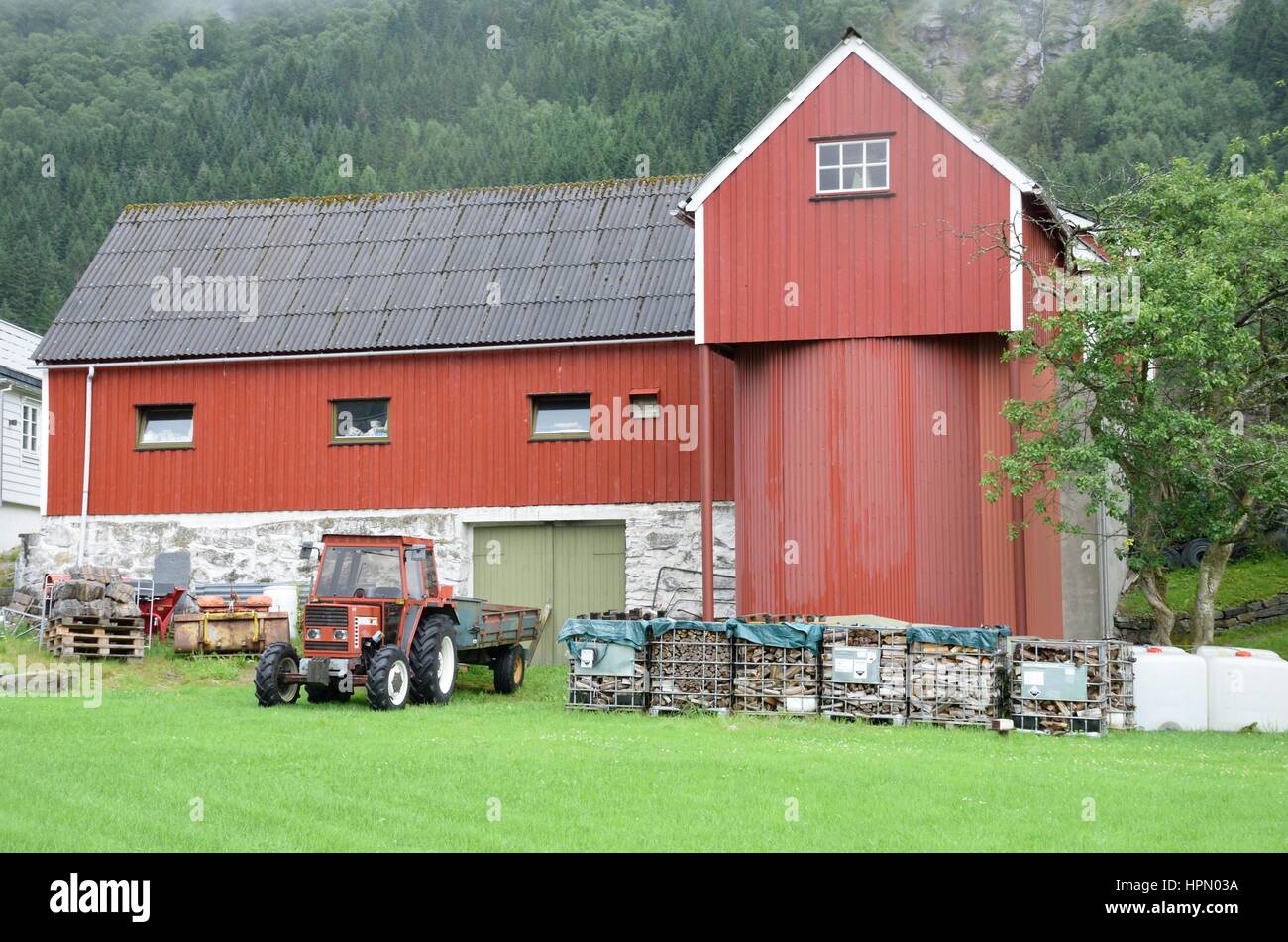 Eidfjord, Norway - July 29, 2016: Typical Small Norweigian farm at foot ...