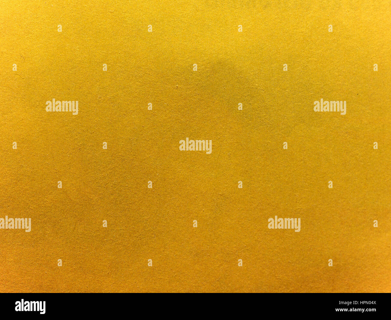 Yellow paper texture useful as a background Stock Photo - Alamy