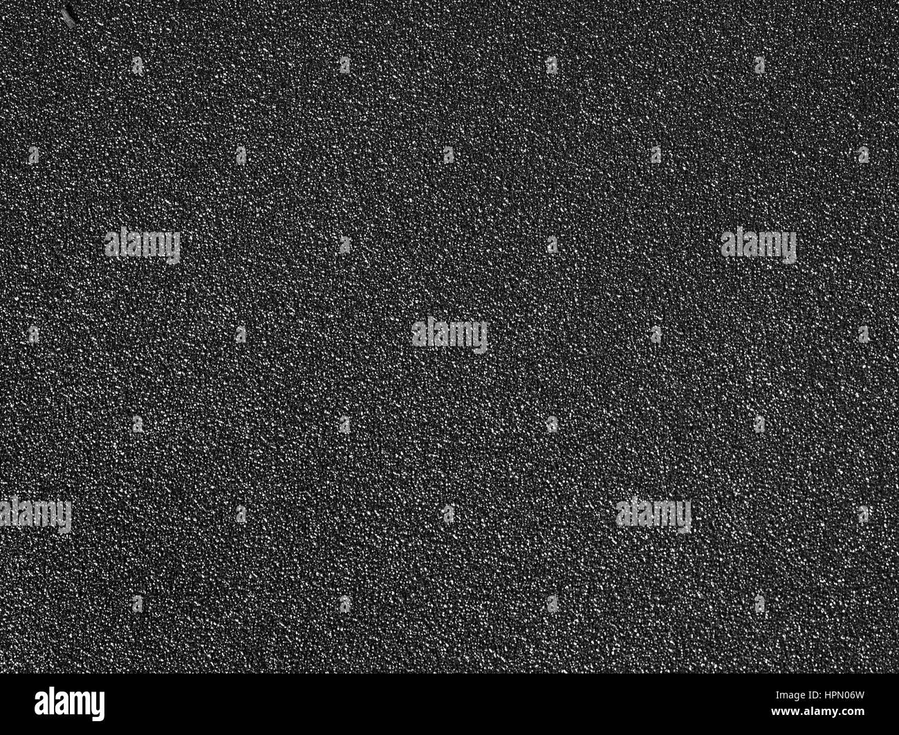 black abrasive paper texture useful as a background Stock Photo - Alamy