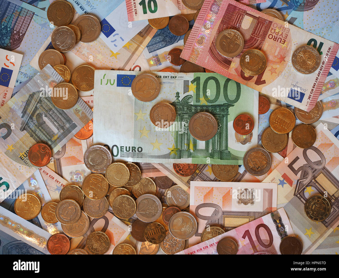 Euro (EUR) banknotes and coins, currency of European Union (EU Stock ...