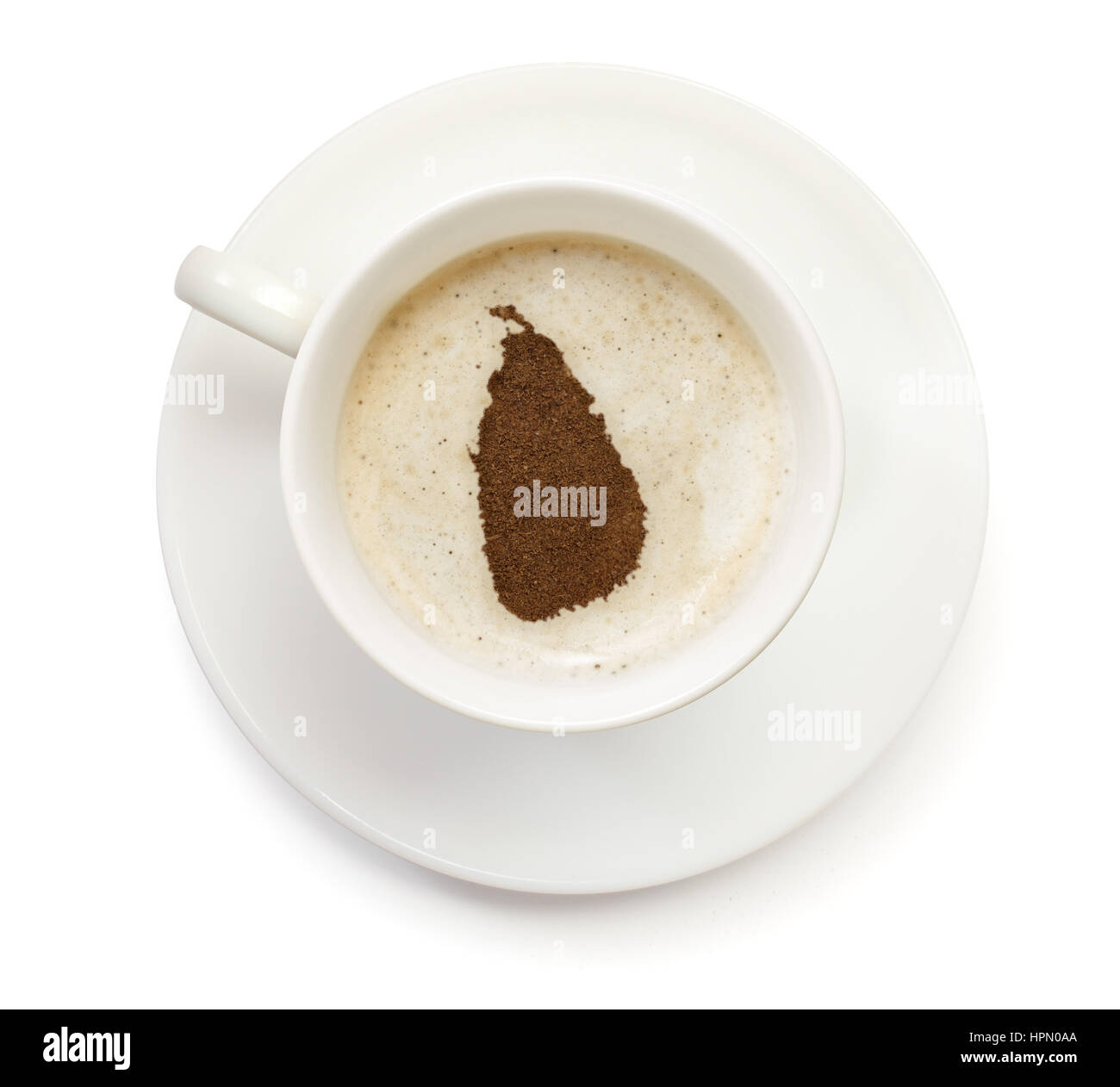 A cup of coffee with foam and powder in the shape of Sri Lanka.(series ...