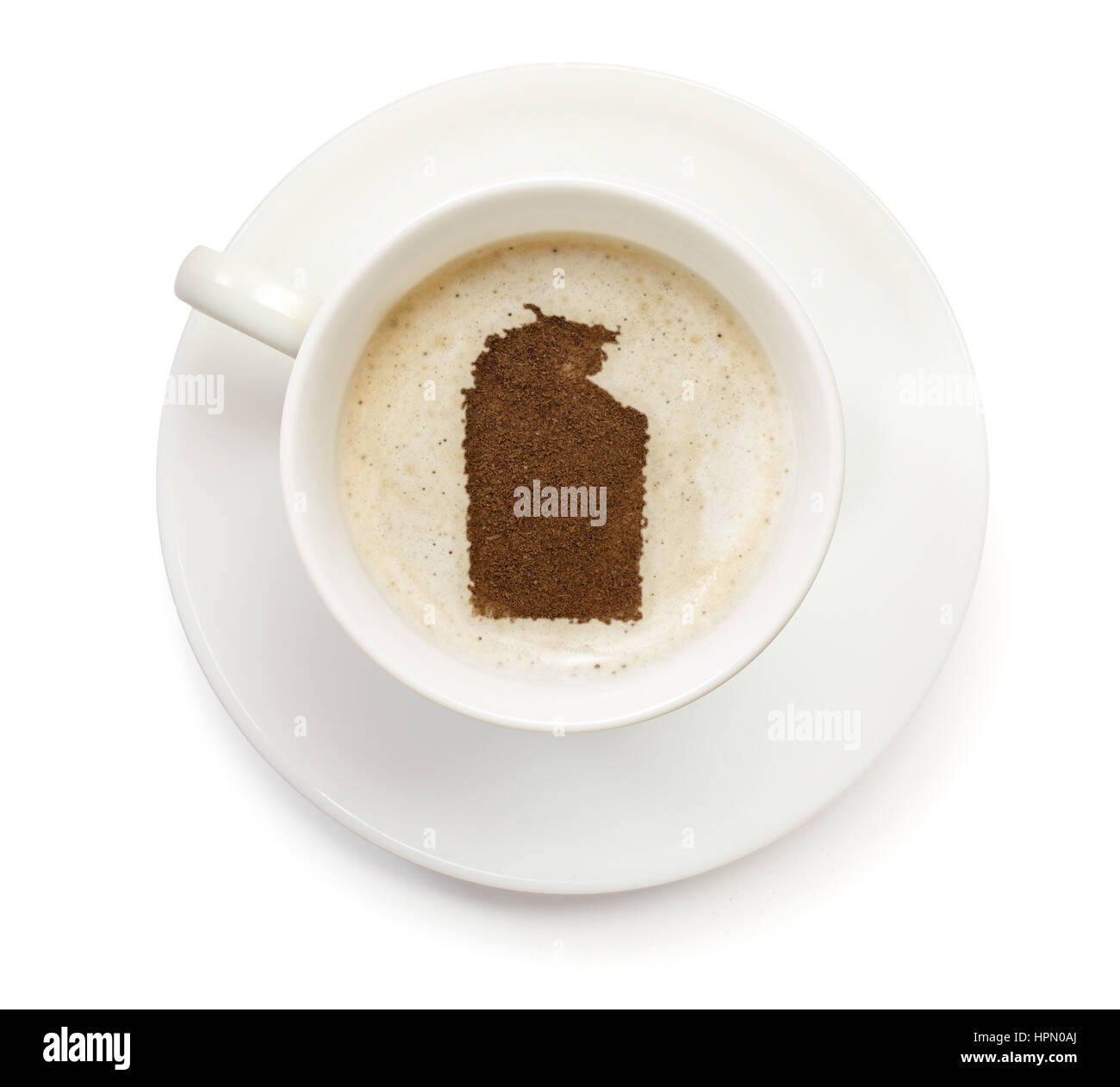 A cup of coffee with foam and powder in the shape of Northern Territory ...