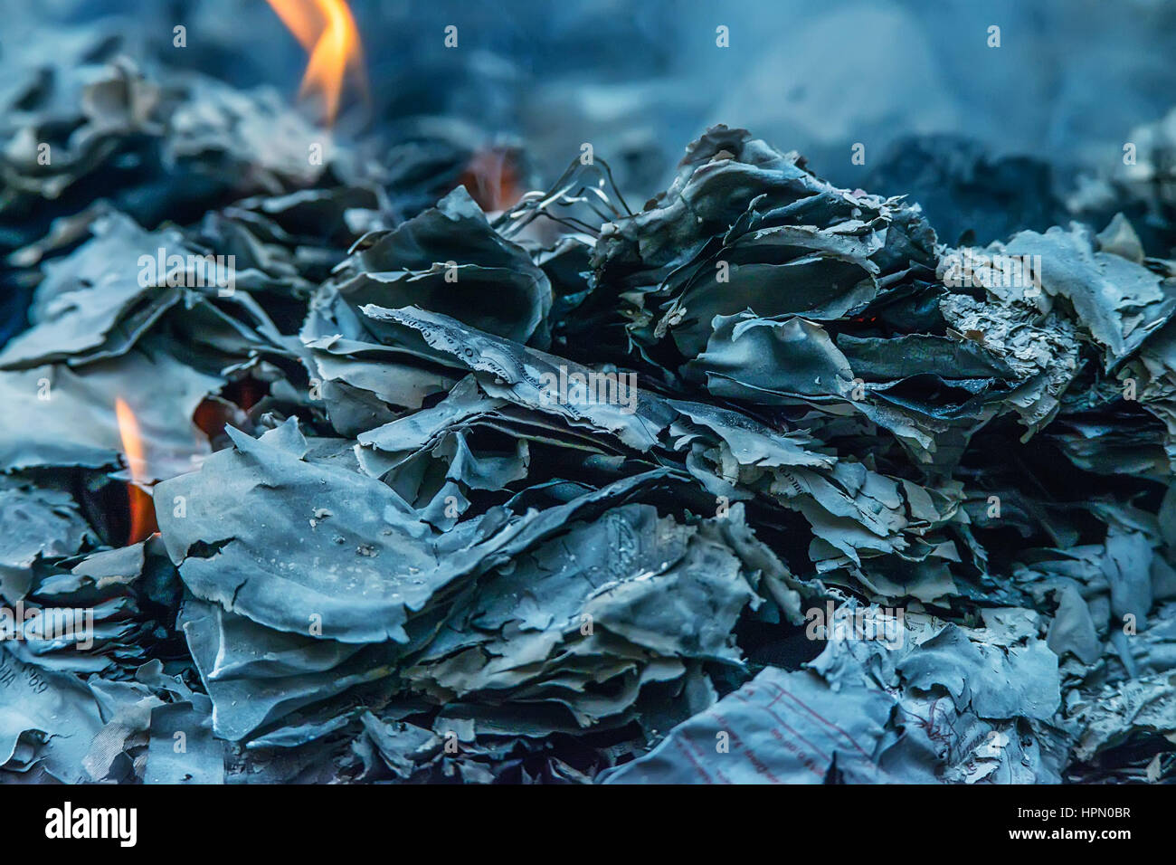 Burnig paper pages and remaining ashes and ember Stock Photo - Alamy