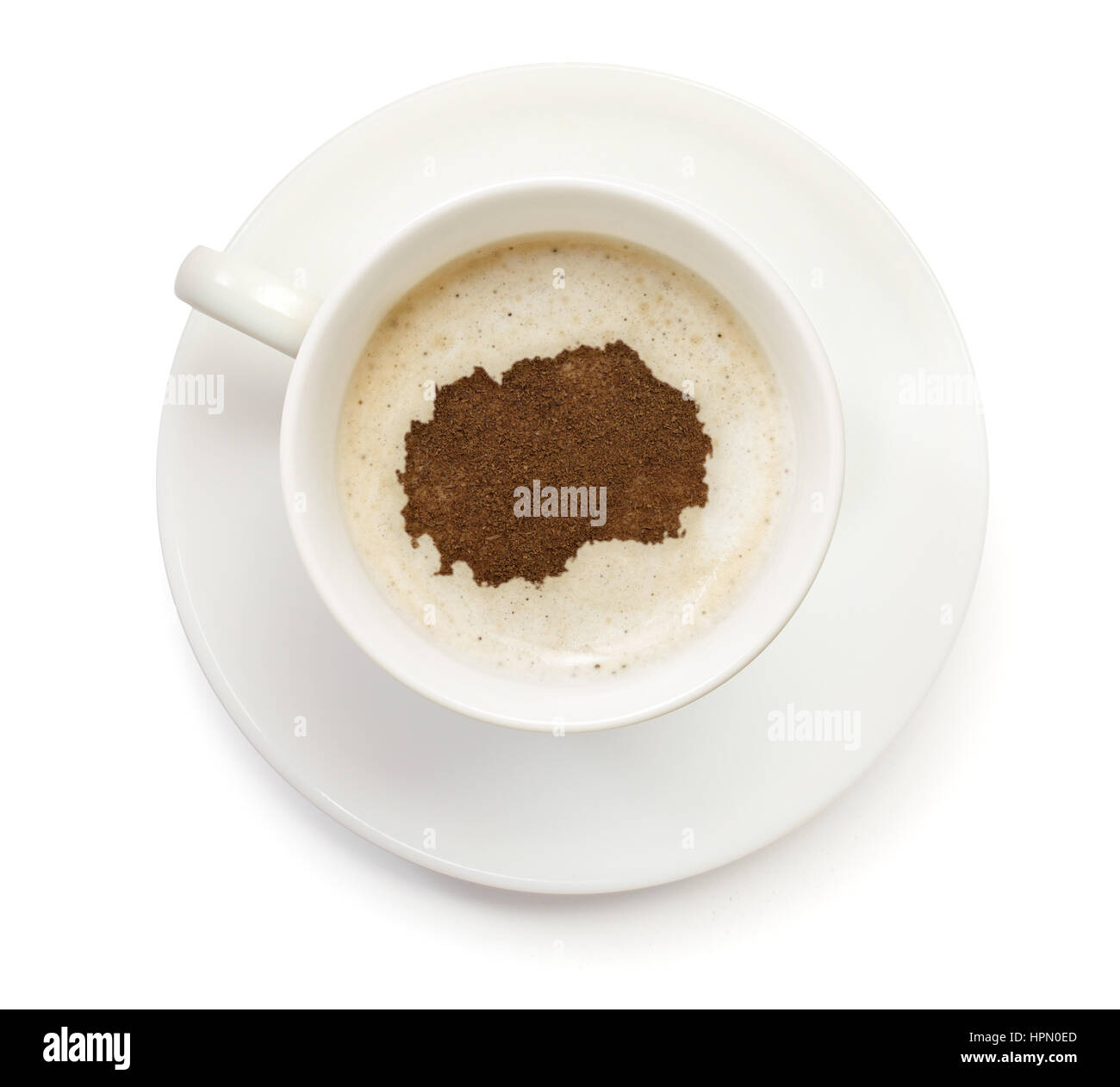 A cup of coffee with foam and powder in the shape of Macedonia.(series ...