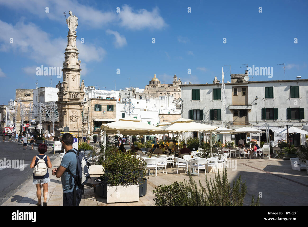 Ostuni vertical Square Ostuni with tourists Ostuni particular square ...