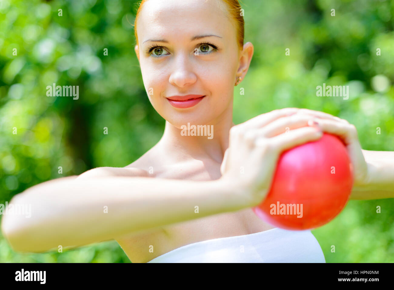 Red woman fitness instructor Stock Photo - Alamy