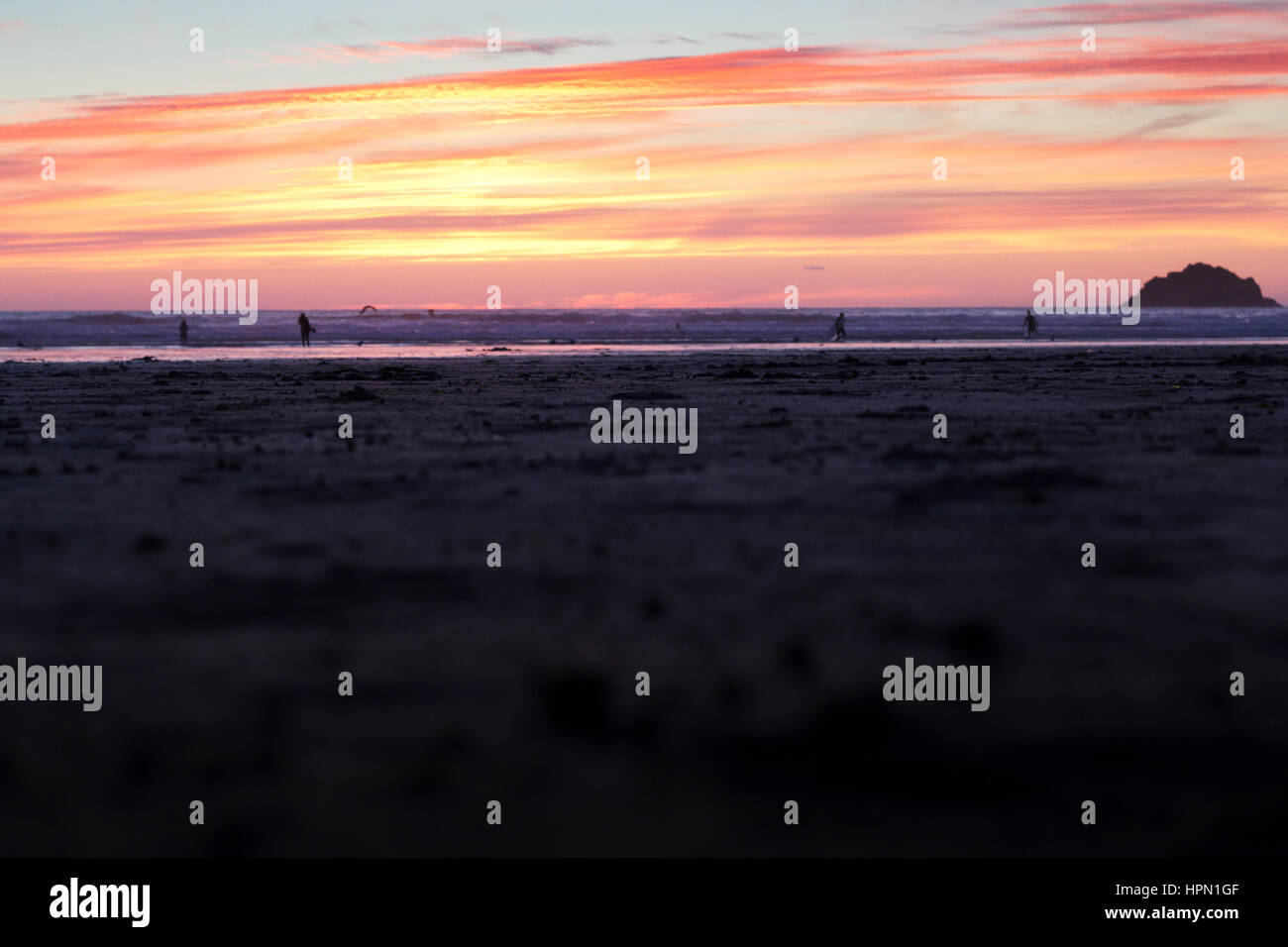Colourful sunset over the beach at Polzeath, Cornwall Stock Photo - Alamy