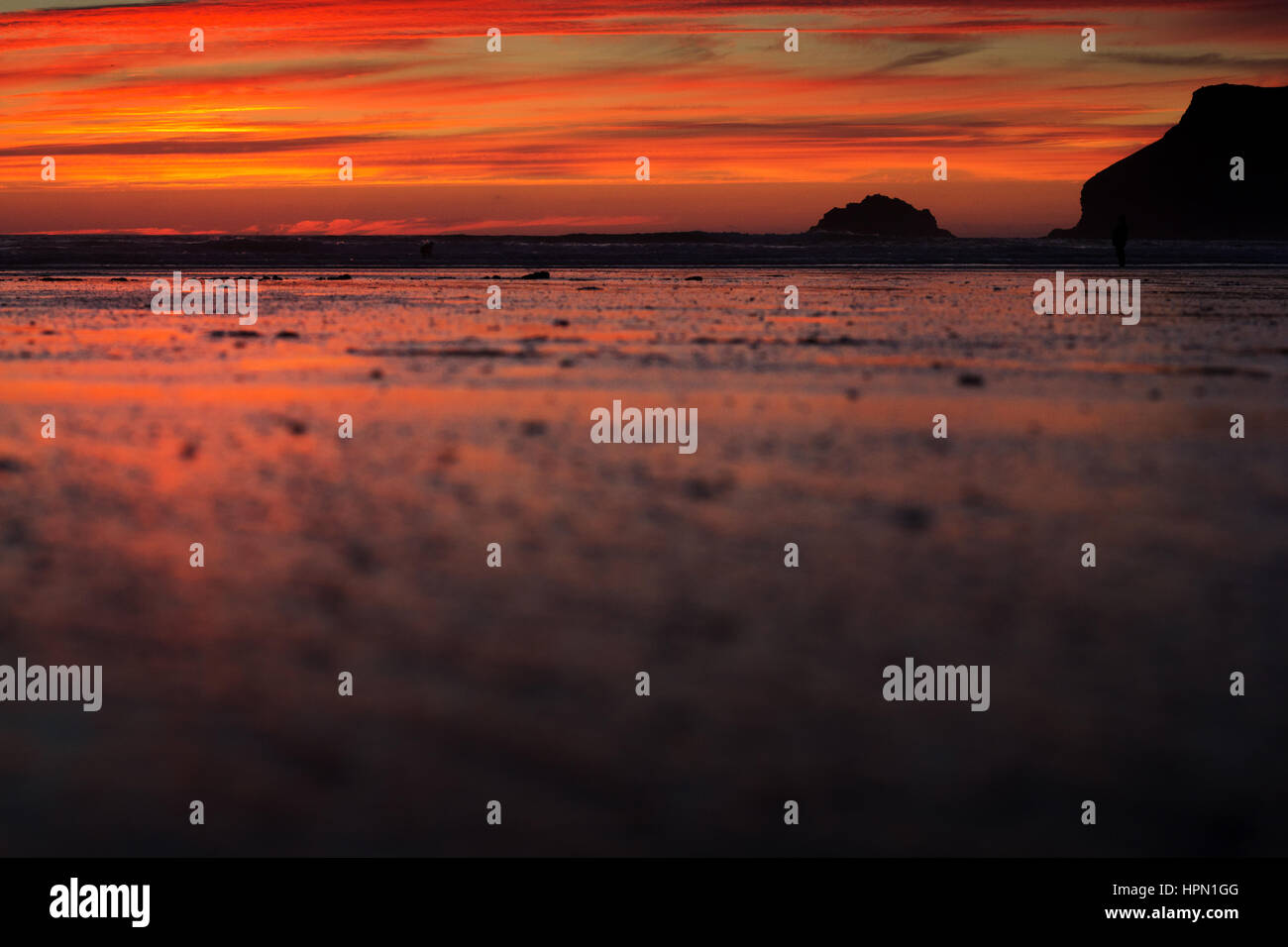 Colourful sunset over the beach at Polzeath, Cornwall Stock Photo - Alamy