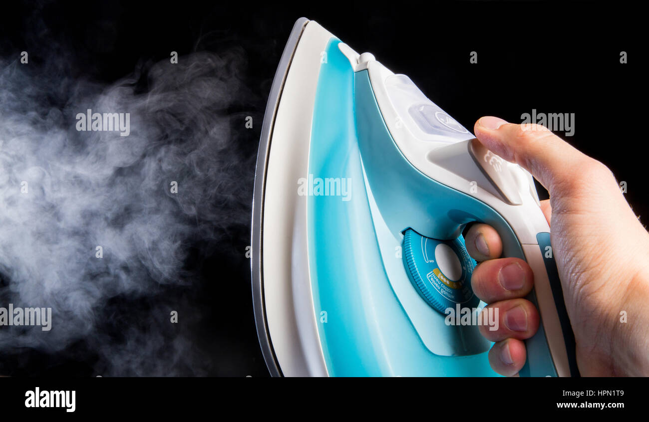 Iron in steam hi-res stock photography and images - Alamy